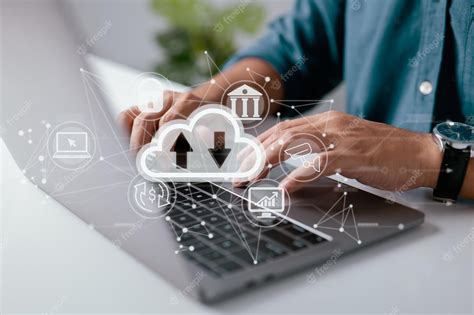 Premium Photo A Man Uses A Laptop With A Cloud Computing Diagram Shown On Hand Cloud