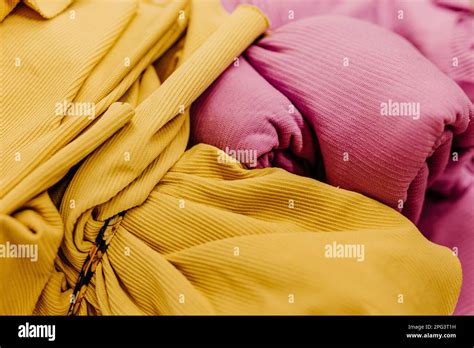 An Array Of Clothing Items Laid Out On A Table For A Commercial Product