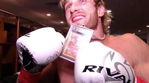 Logan Paul Wears Pokemon Charizard Chain Against Floyd Mayweather