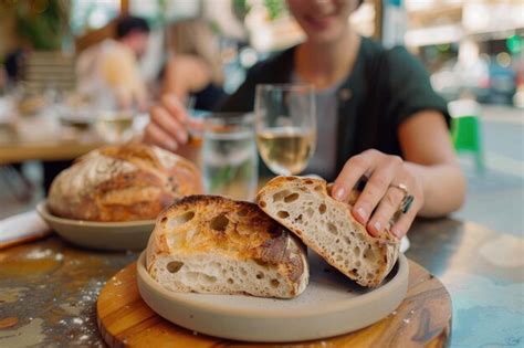 Eating Bread In A Restaurant Premium Ai Generated Image