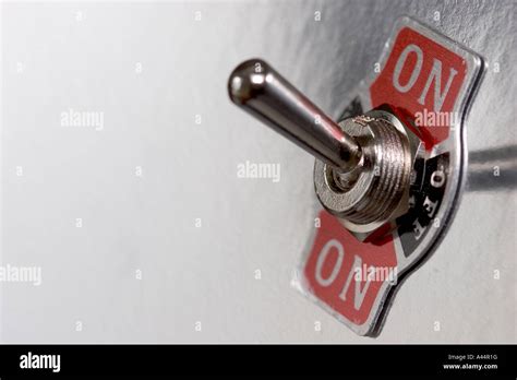 Abstract Graphic Image Of An Electric Toggle Switch On A Shiny Silver Background Stock Photo Alamy