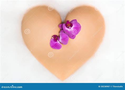 Female Booty In Shape Of A Heart With Orchid Stock Image Image Of