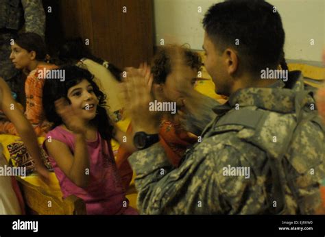 A Young Iraqi Girl Teaches Us Army 1st Lt German Gonzalez 320th