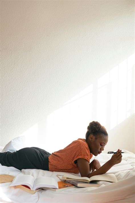 Person Laying On A Bed Photos Download The Best Free Person Laying On