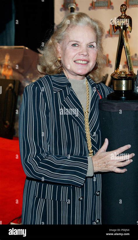 Carol Baker Posing With The Statue Of The Hollywood Hall Of Fame On The