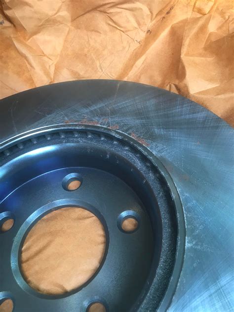New rotor came with some rust, won’t come off with brake clean, safe to run? : r/MechanicAdvice