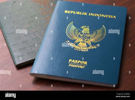 Indonesian Passport On A Wooden Background Travel And Immigration