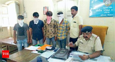 thrashing trader four arrested for thrashing trader rajkot news times of india