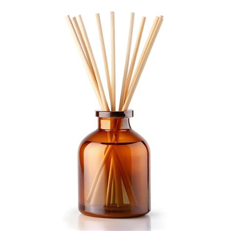 Premium Photo Brown Glass Essential Oil Diffuser Container With Wood Sticks Cut Out