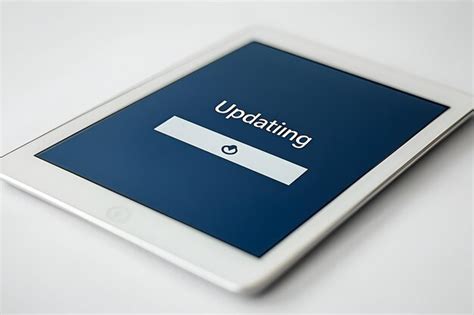 Updating Software On Digital Tablet Or Mobile Device Screen With Loading Progress Bar Premium