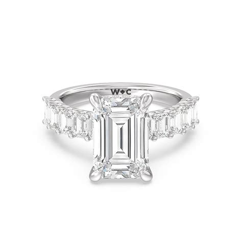 Hidden Halo Emerald Side Stones Engagement Ring With Clarity
