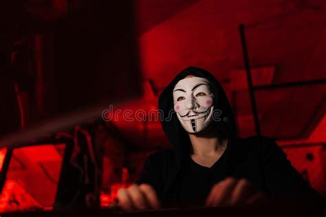 Close Up Low Angle View Of Dangerous Hacker Man Wearing Anonymous Mask