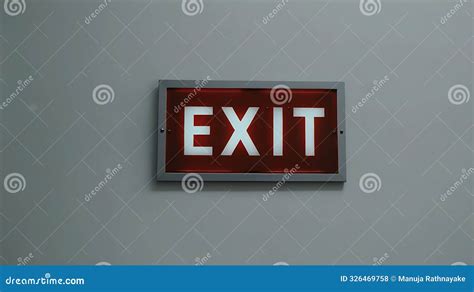 Exit Sign In Building Emergency Exit Indicator With Directional Arrow In Commercial Space