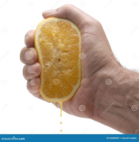 Orange Juice Squeeze : Fresh Orange Half Being Squeezed By Hand Stock Image - Image: 52080967