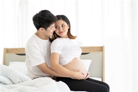 Passionate Lovers Couple Embracing In Bed Before Making Lov Stock Image