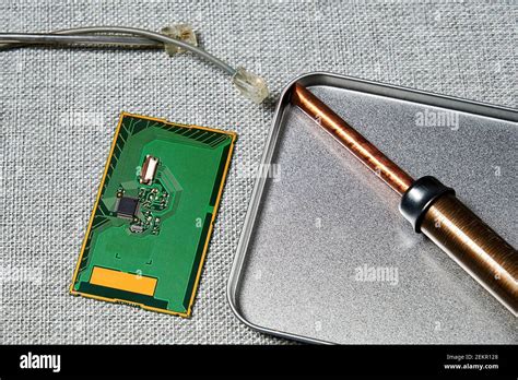 Microchip Pcb Wires Soldering Iron In The Manufacturing Laboratory