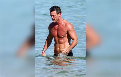 Luke Evans Shows Off Chiseled Body In Tiny Speedo On Miami Beach Gets Cozy With Mystery Man