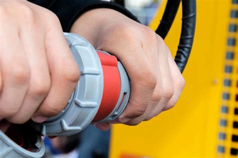 Premium Photo Engineers Are Connecting Wires To Start Work Industrial Work Is A Security