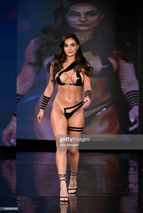 A Model Walks The Runway Wearing Black Tape Project During New York