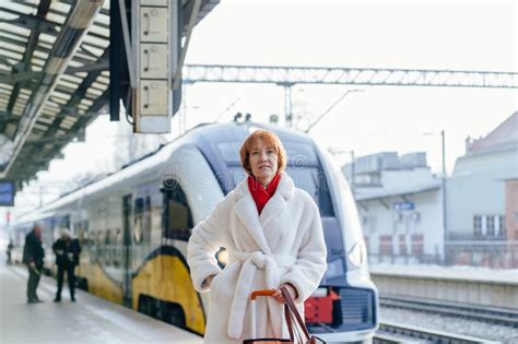 Calm Mature Business Traveler Waiting For Train On Platform Stock Image