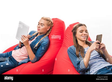 Girls Using Digital Devices Stock Photo Alamy