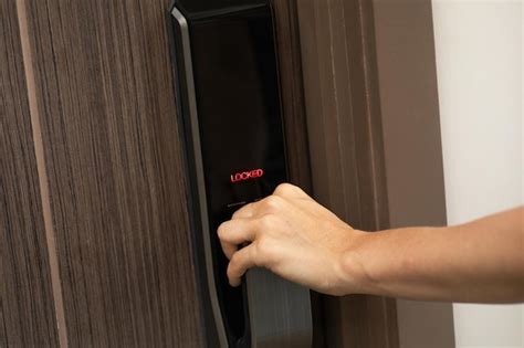 Premium Photo Female Hand And Digital Smart Code Lock Into The Modern Apartment