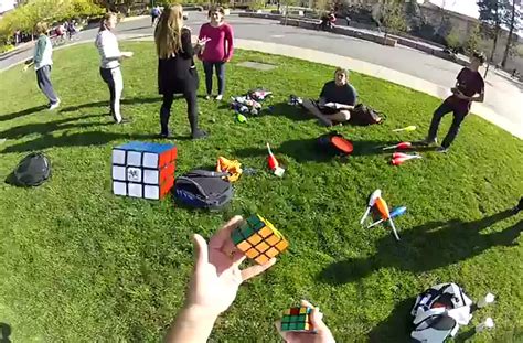 Kid Solves Three Rubik S Cubes While Juggling Them