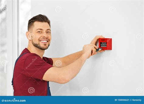 Electrician Installing Fire Alarm System Stock Image Image Of Person Flame 150056621