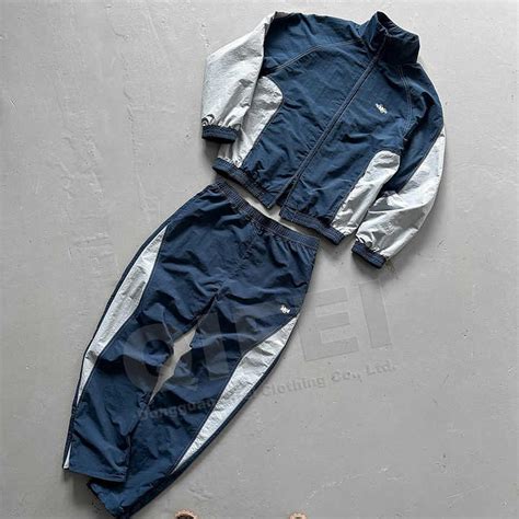 Custom Tracksuit Manufacturer Polyester Nylon Baggy Sport Sweatsuit
