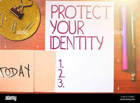 Hand Writing Sign Protect Your Identity Word Written On Secure From Data Breach And Information