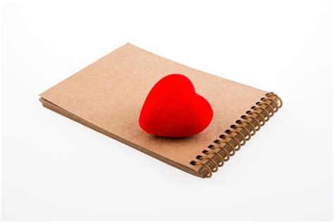 Premium Photo Heart On Notebook