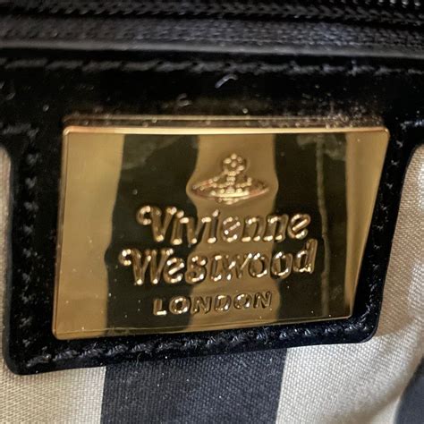 Vivienne Westwood Python Print Heart Handbag Womens Fashion Bags