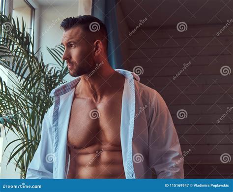 Portrait Of A Tall Bearded Male With A Muscular Body Stock Image