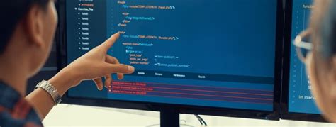 Premium Photo Female Programer Explain While Pointing Code Displayed