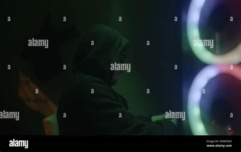 Programmer Or Hacker Working On Desktop Computer With Green Lights In