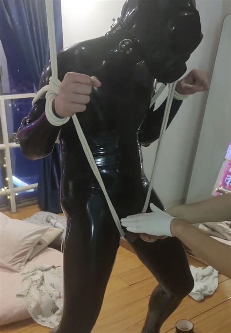 Rubber Gimp And Gas Mask Got His Dick Massaged