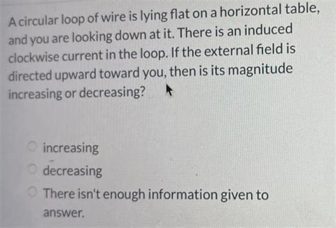solved a circular loop of wire is lying flat on a horizontal
