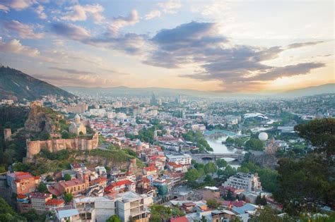 Beautiful Landscape Of Tbilisi On The Background Of Blue Cloudy Sky And