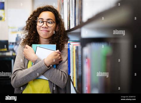 Ready To Study Hard Happy Nerd Woman In Library Book Lover Stock Photo Alamy