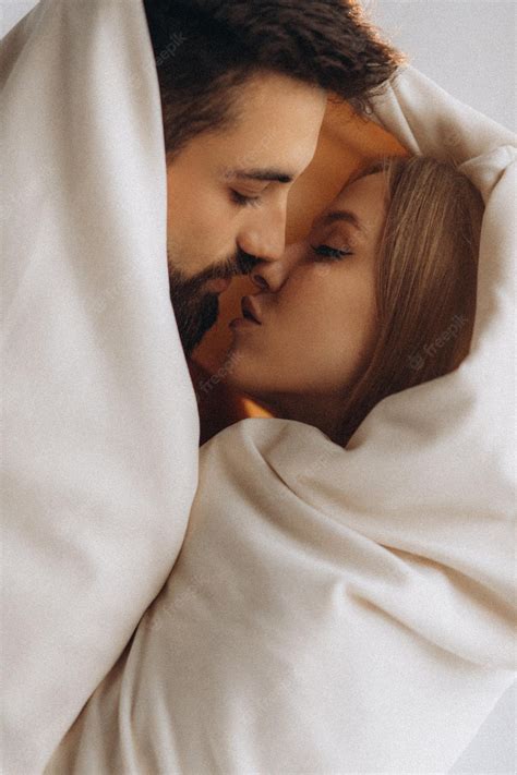 Premium Photo Sexy Couple In A Blanket