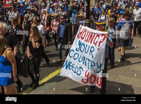 Crowds Of People March Along Whitehall In Anti Brexit Protest Carrying