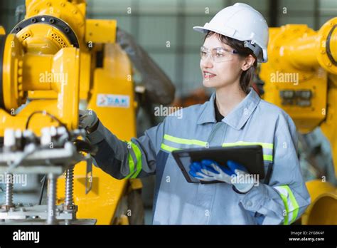 Engineer Woman Working In Advance Machine Factory Female Worker