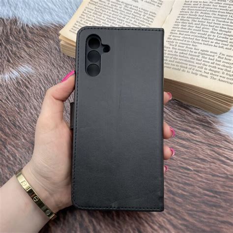 کیف گوشی Galaxy A04s سامسونگ چرم مگنتی جاکارتی محافظ لنزدار مشکی کد