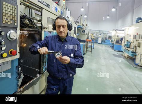 Worker Measuring With Caliper Area Automated Cnc Lathes Machined Indecober Machining Of