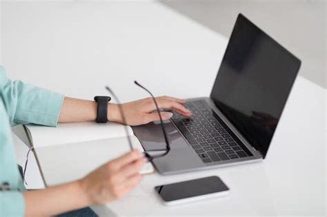 premium photo millennial caucasian woman boss in suit typing on