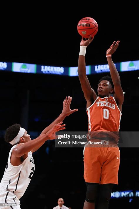 Tevin Mack Of The Texas Longhorns Shoots Three Pointer Against The