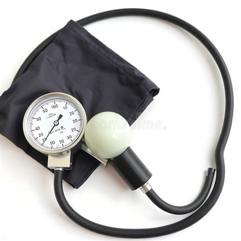 A Manual Sphygmomanometer With A Cuff Bulb And Analog Gauge On A