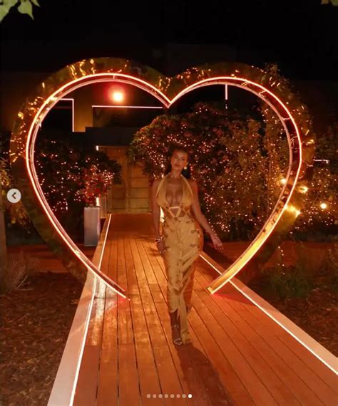 Maya Jama Stuns In A Plunging Gold Dress Showcasing Her Curves In A