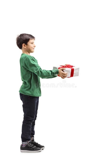 Little Boy Giving A Wrapped Present Stock Image Image Of Gesturing
