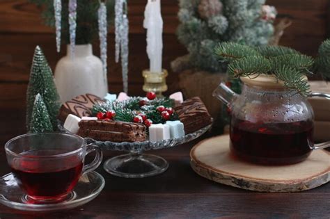 Premium Photo Beautiful New Years Eve Candlelit Dinner With Sweet Cakes Christmas Trees And